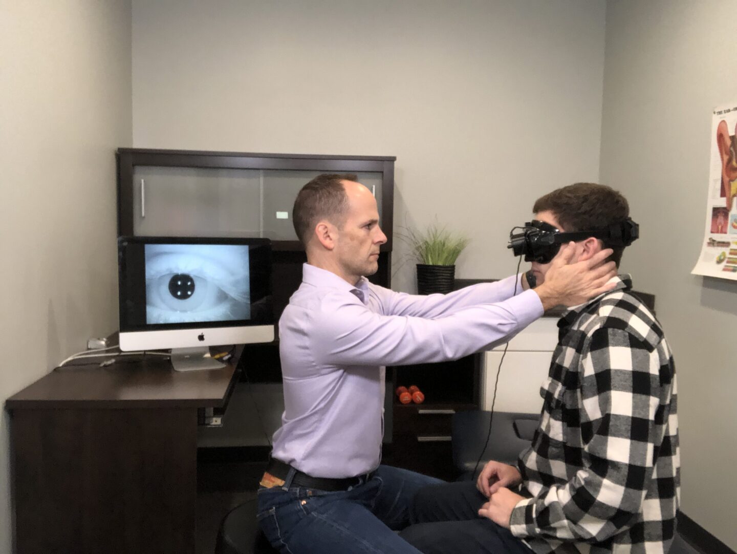 Helping a patient with vertigo using VNG goggles - North 49 Physical ...